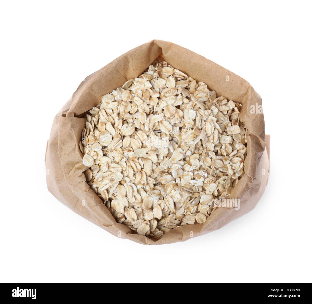 Raw oatmeal in paper bag isolated on white, top view Stock Photo - Alamy