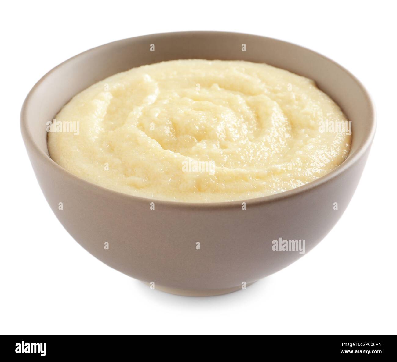Bowl with delicious semolina pudding on white background Stock Photo ...