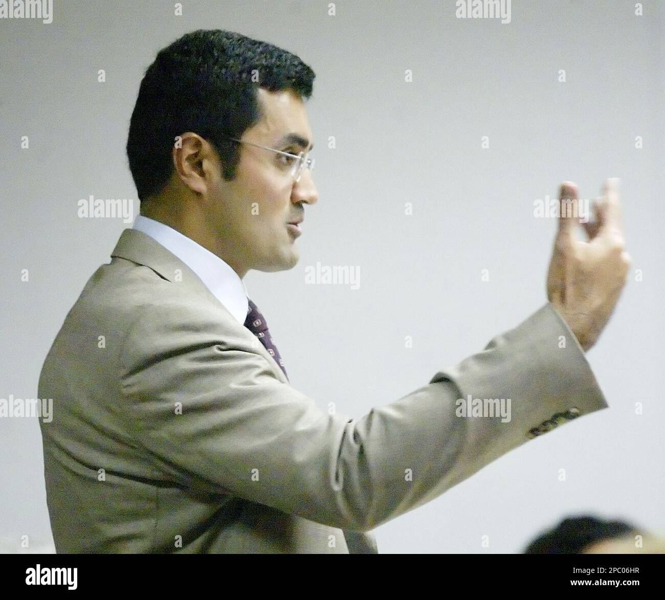 Defense attorney Manny Arora talks to Cobb County Superior Court Judge ...