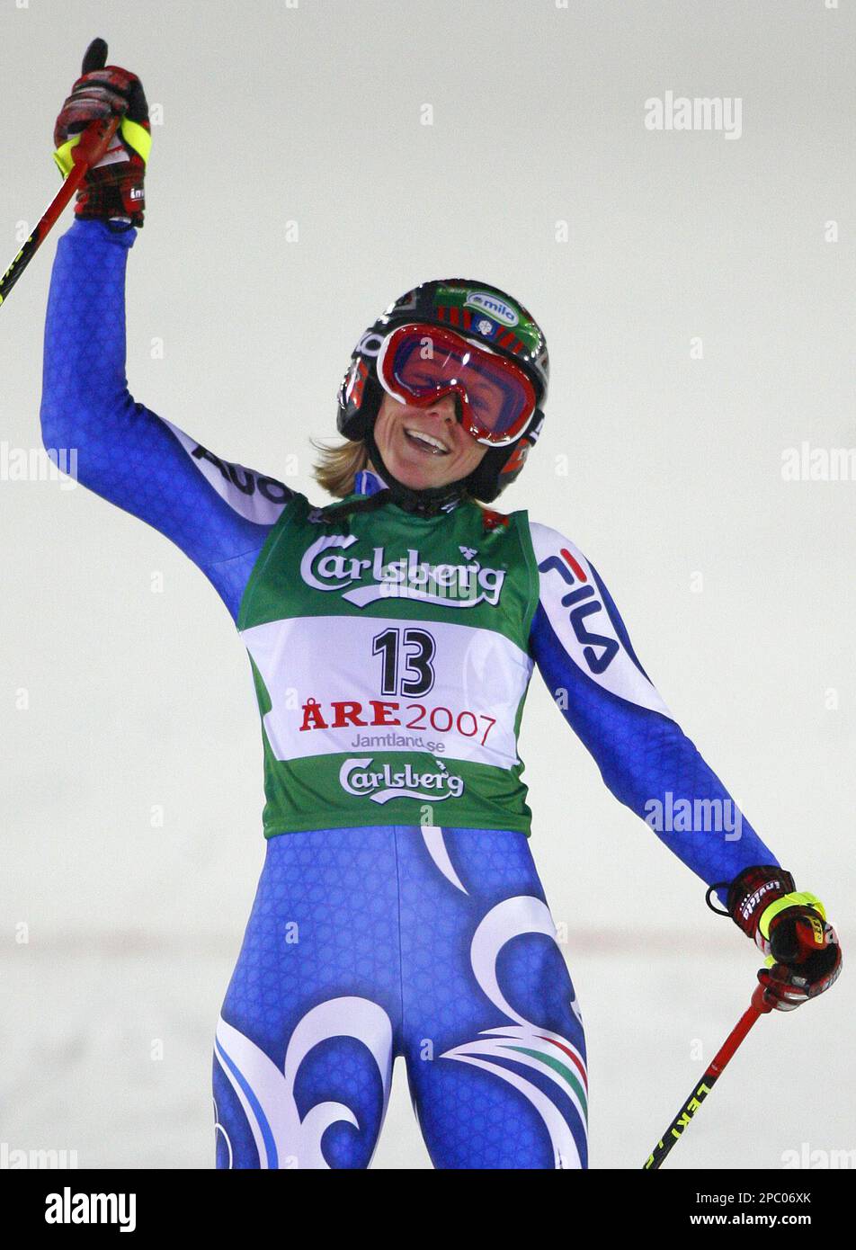 Italy's Denise Karbon celebrates after winning the bronze medal in the ...