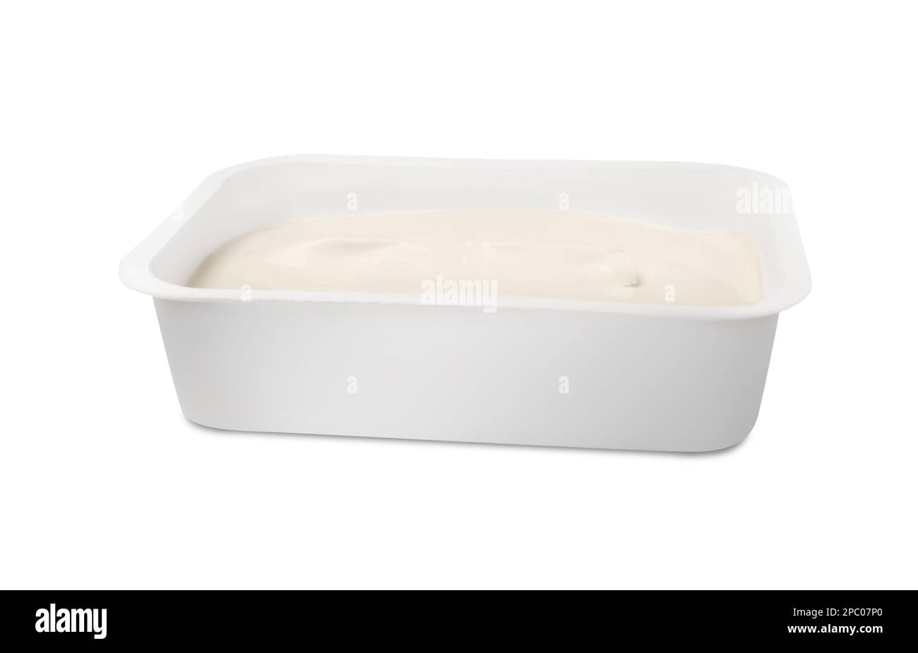 Plastic container of tasty cream cheese isolated on white Stock Photo ...