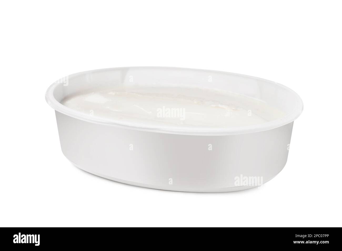 Plastic container of tasty cream cheese isolated on white Stock Photo ...
