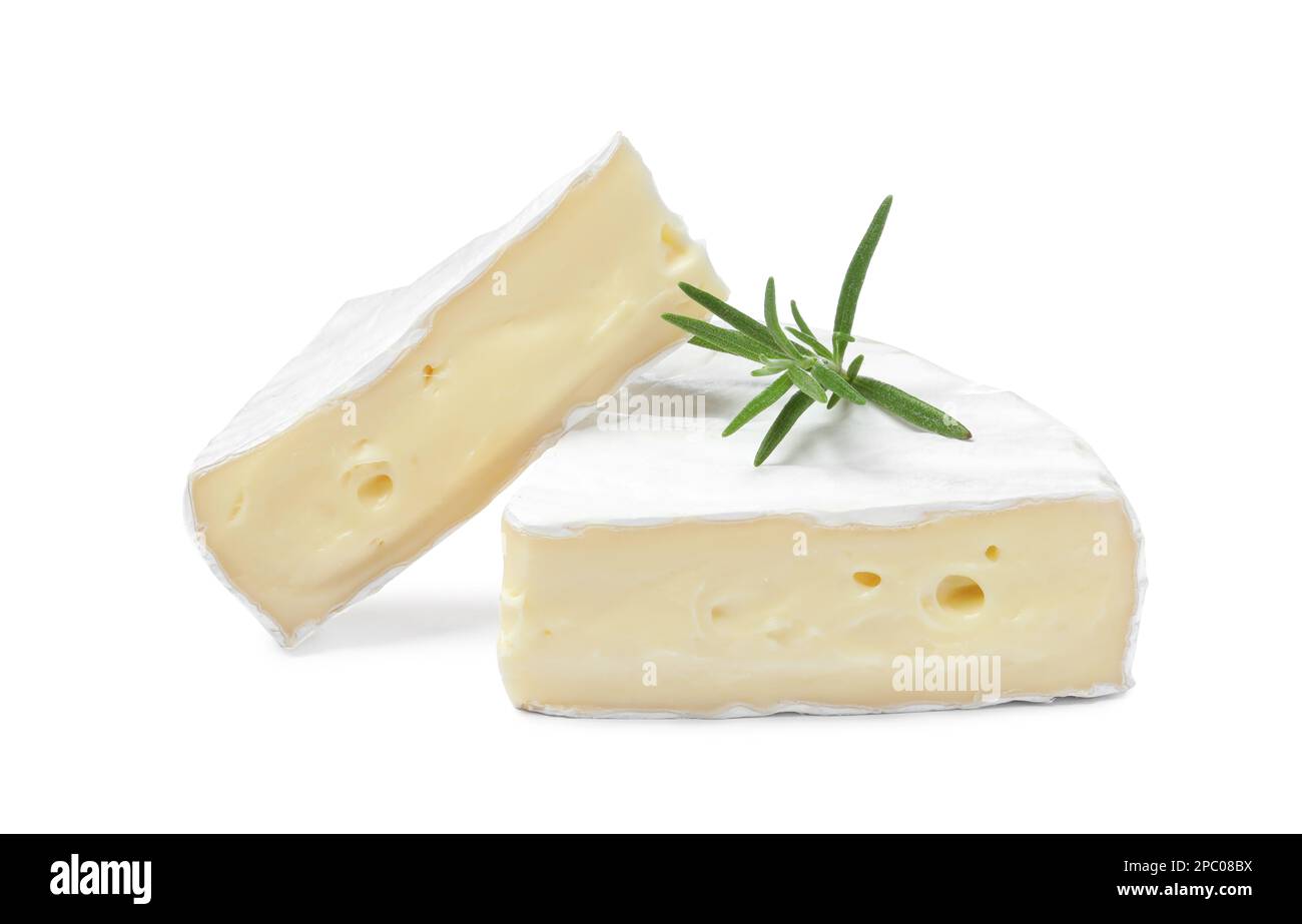 Tasty cut brie cheese with rosemary on white background Stock Photo - Alamy