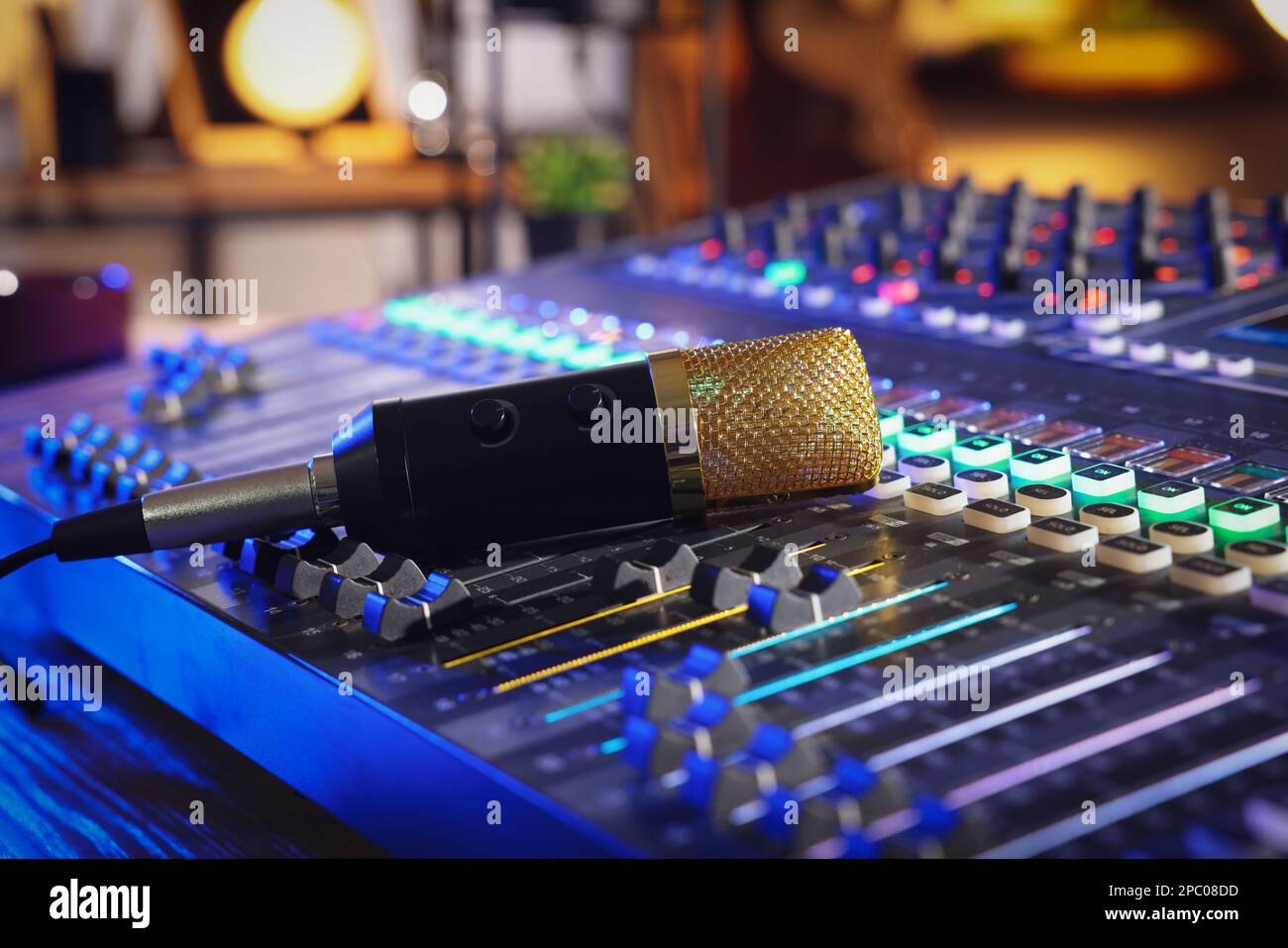 Microphone on professional mixing console in radio studio, closeup ...