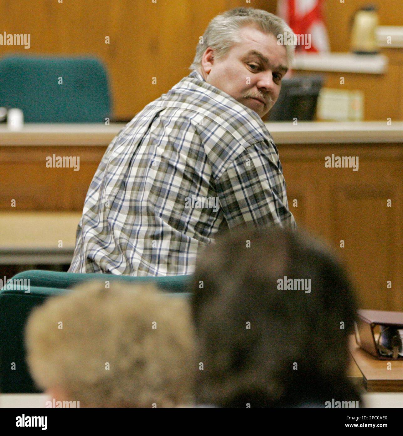 Steven Avery looks back at his family as he enters a Calumet County ...