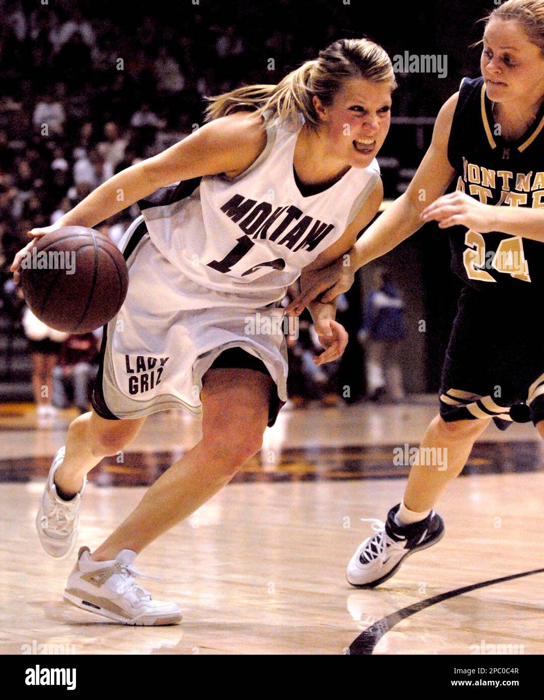 Montana's Sonya Rogers, left, drives past Montana State's Alyssa Nelson ...