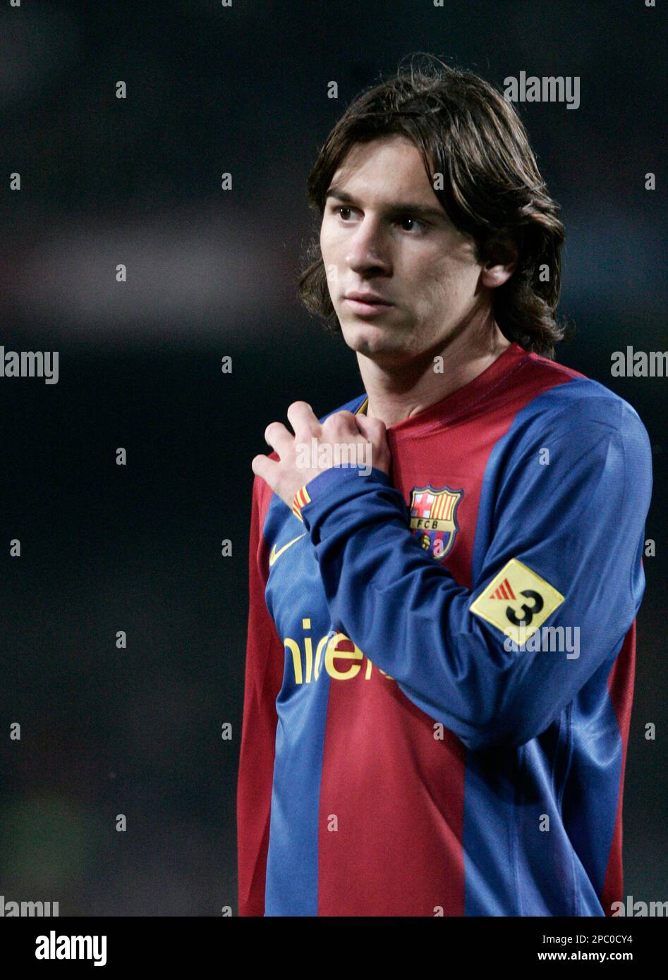 Barcelona player Lionel Messi is seen against Racing Santander during a ...