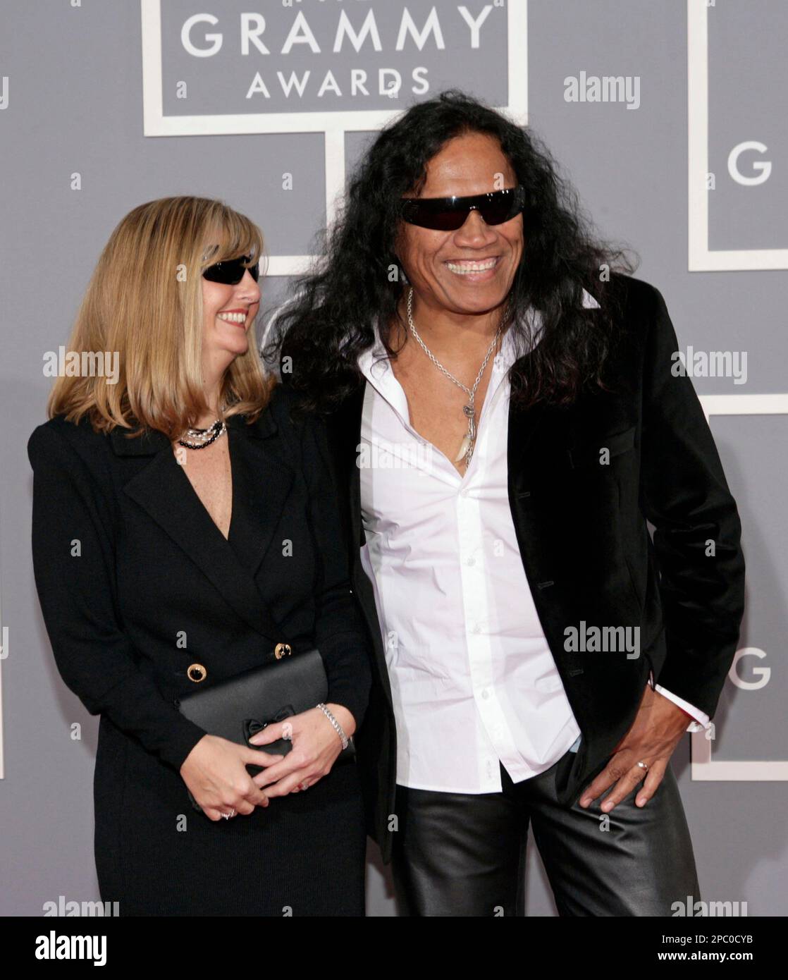 Musicians Lezlee Kaaihve, left, and Henry Kapono arrives for the 49th ...