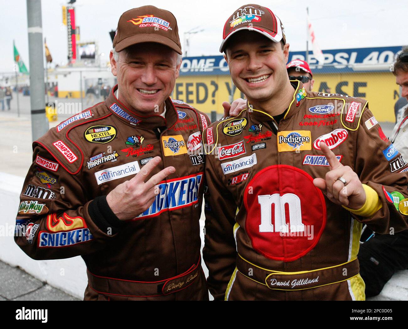 NASCAR drivers Ricky Rudd, left, and David Gilliland hold up fingers to ...
