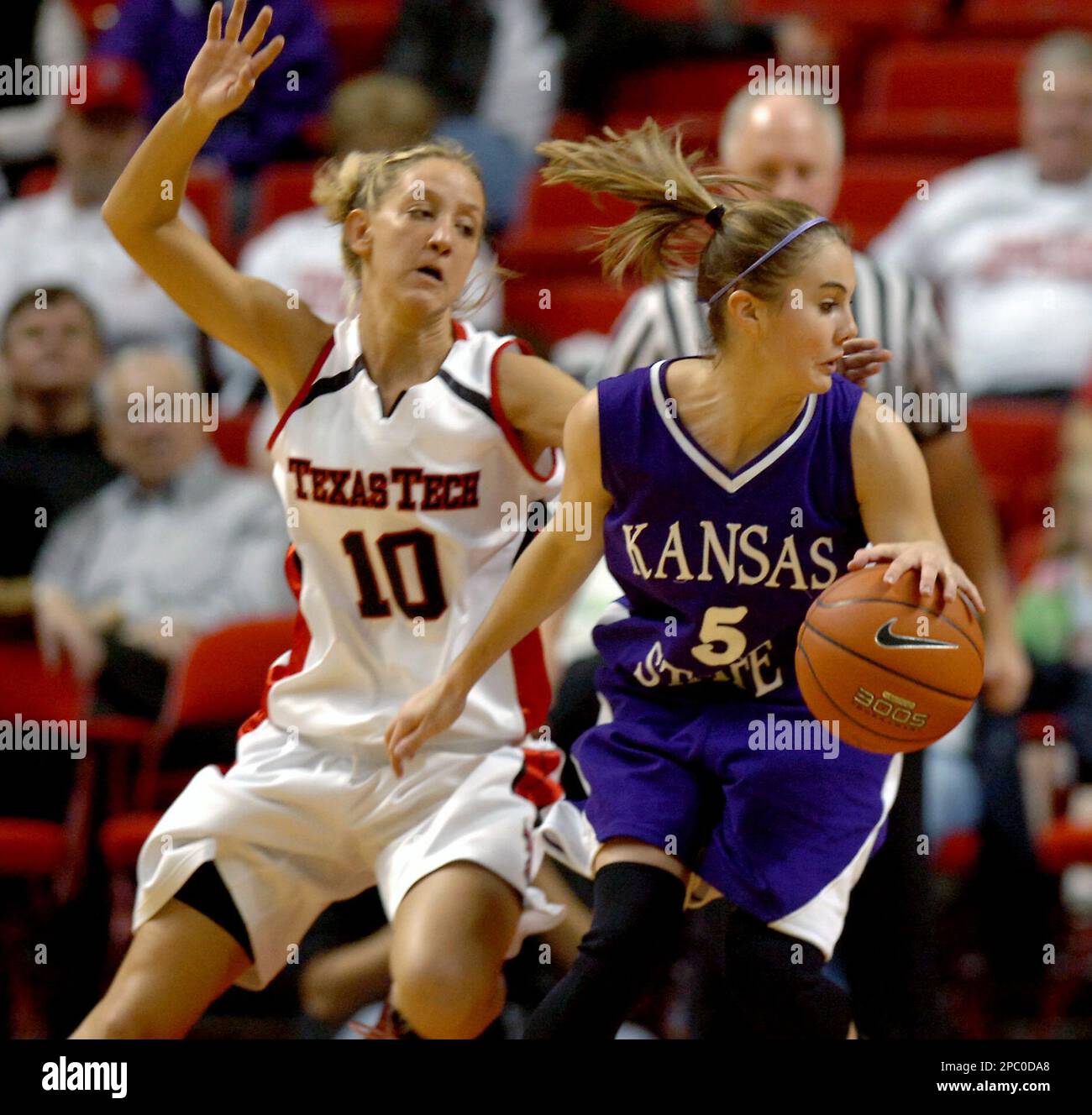 Kansas State's Shalee Lehning (5) turns to dribble away from Texas Tech ...