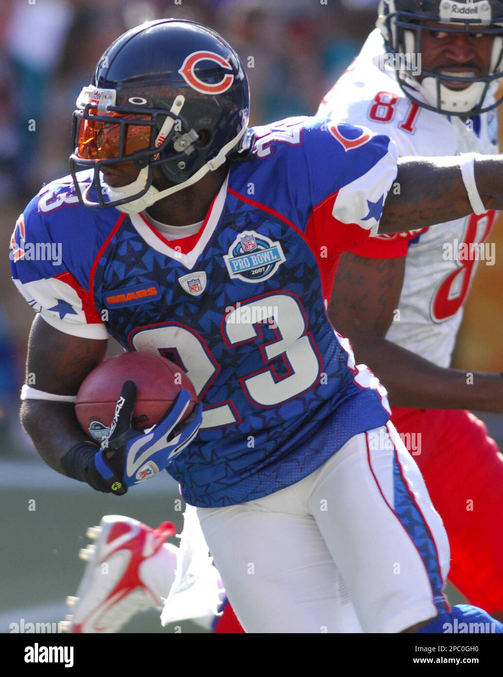 NFC Chicago's Devin Hester (23) runs for yardage against AFC San Diego ...