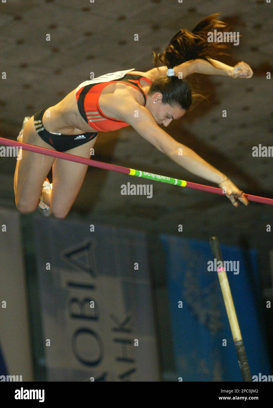 Russian Olympic champion Yelena Isinbayeva jumps to clear 4.93 meters ...
