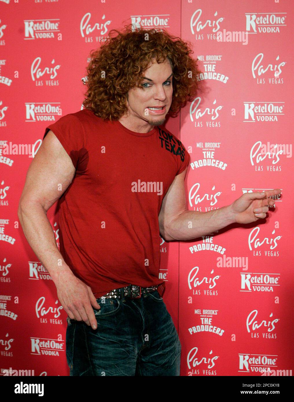Comedian Carrot Top poses for photos at the grand opening of the ...