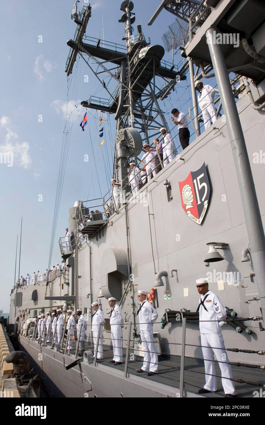 Sailors line up aboard the guided missile frigate USS Gary as it sails ...