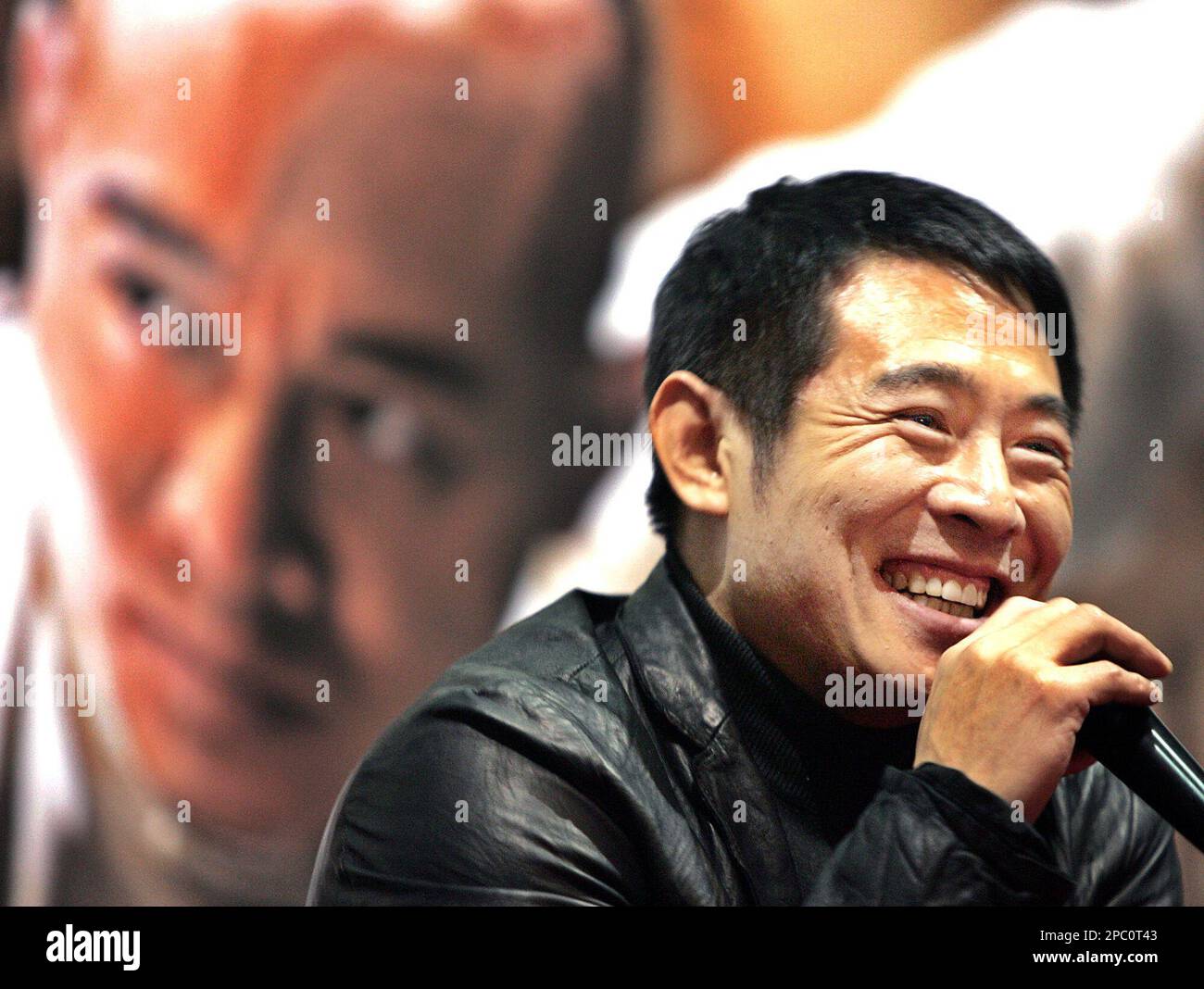 ** FILE ** Chinese actor Jet Li smiles during a news conference to ...