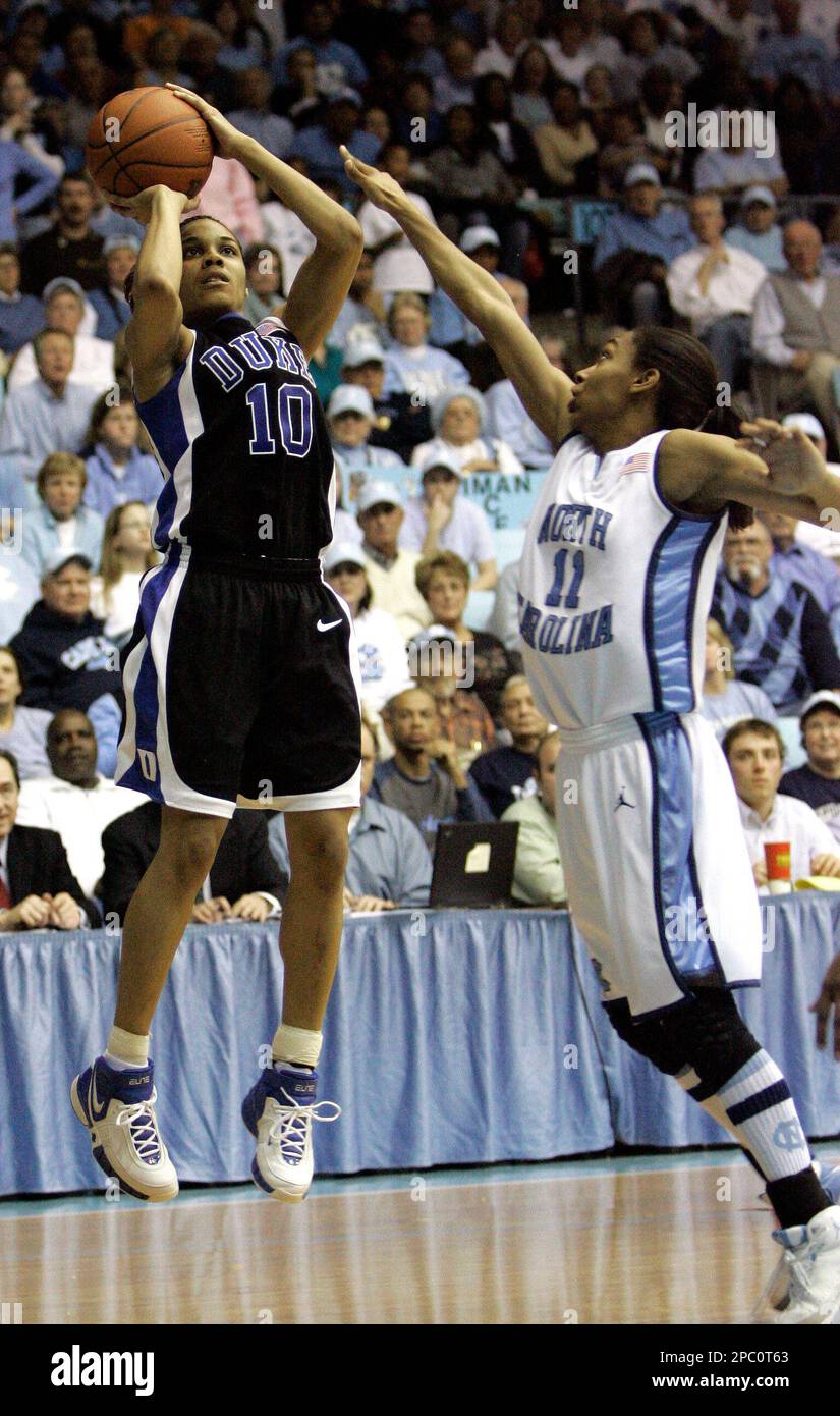 Duke's Lindsey Harding (10) shoots over North Carolina's Alex Miller ...