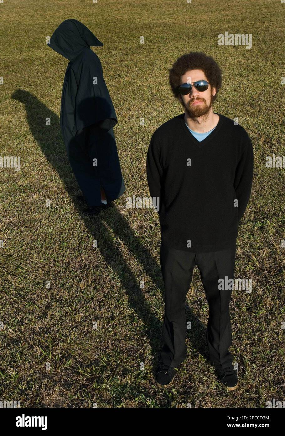 Brian Joseph Burton, better known by his stage name Danger Mouse, right ...