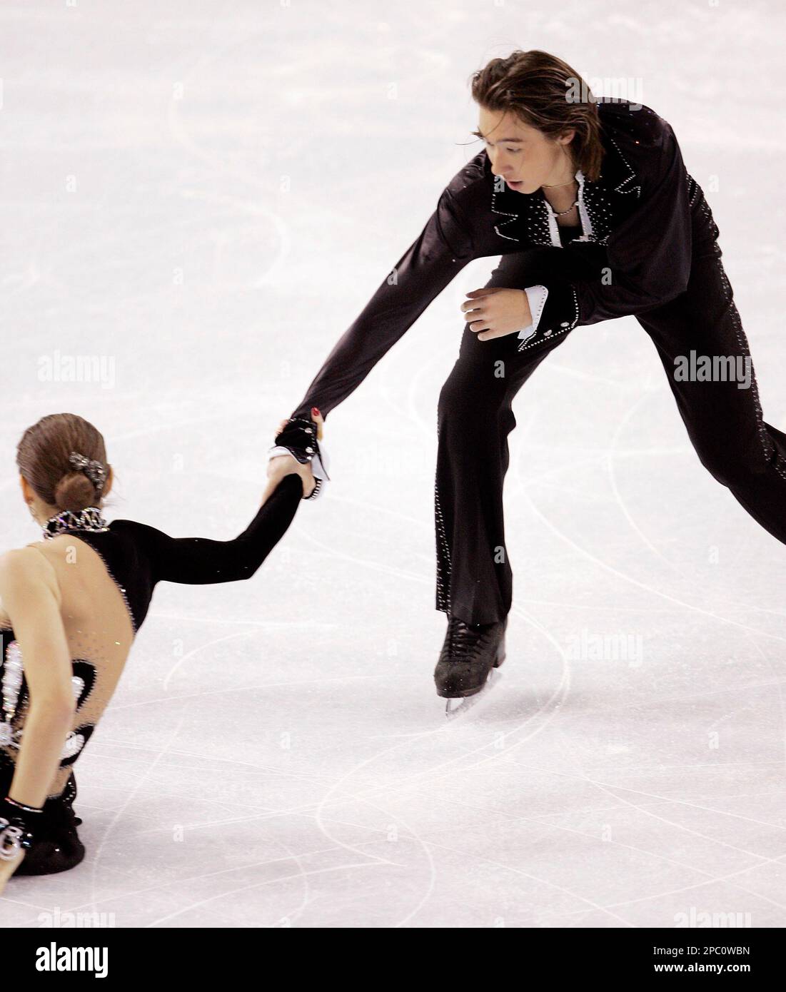 Japan's Chris Reed, right, reaches for partner Cathy Reed after she ...