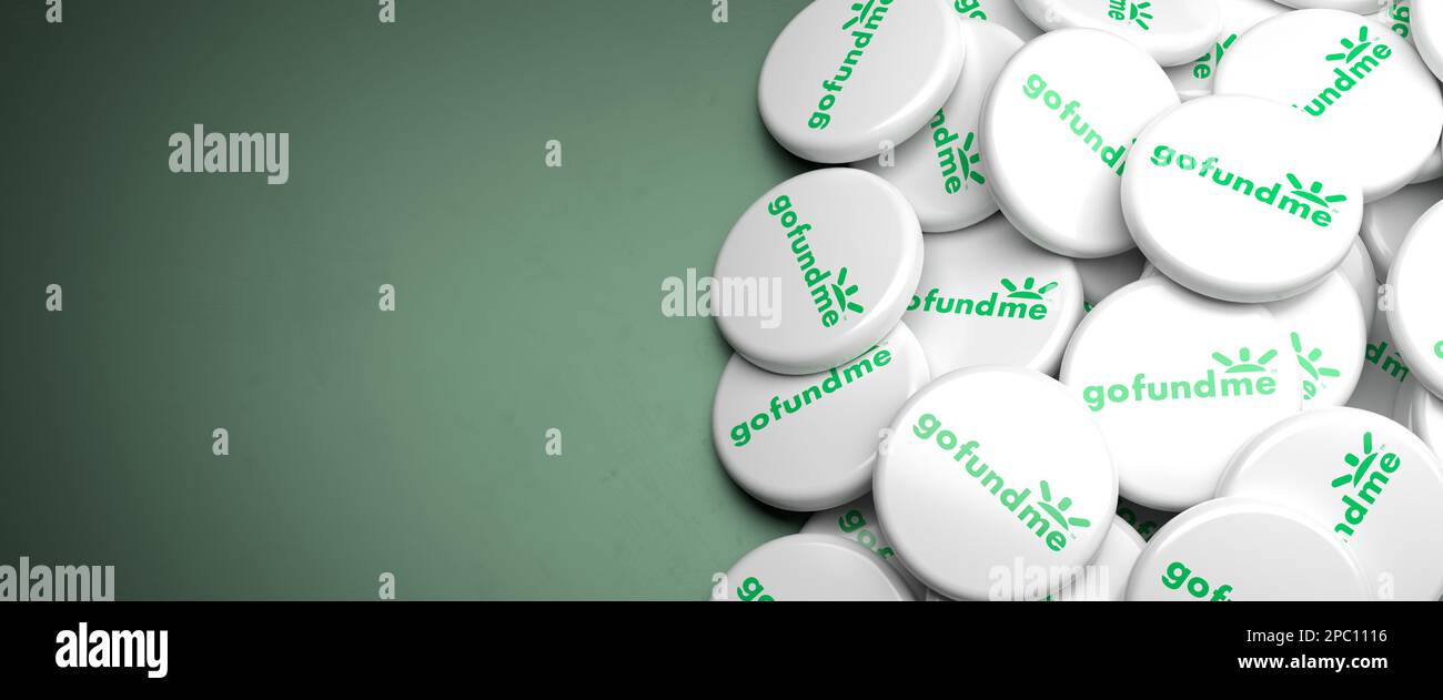 Logos of GoFundMe the crowdfunding platform and company on a heap on a ...