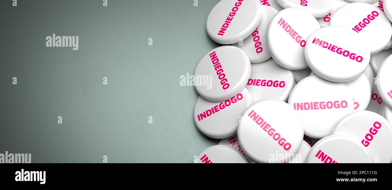 Logos of Indiegogo the crowdfunding platform and company on a heap on a ...