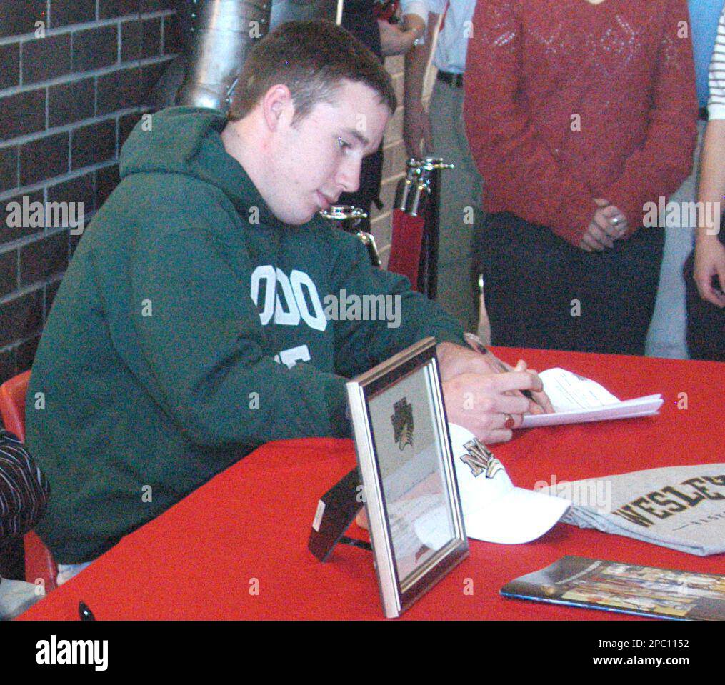 Regis High School quarterback Klay Kubiak signs his letter of intent to ...
