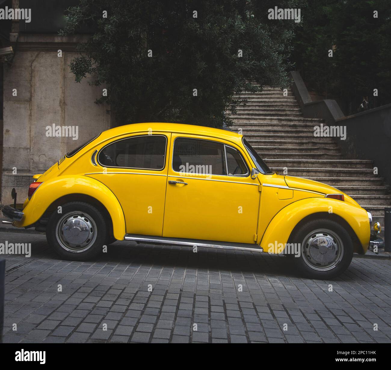 vintage yellow car parked outdoors. retro style. antique vehicle Stock ...
