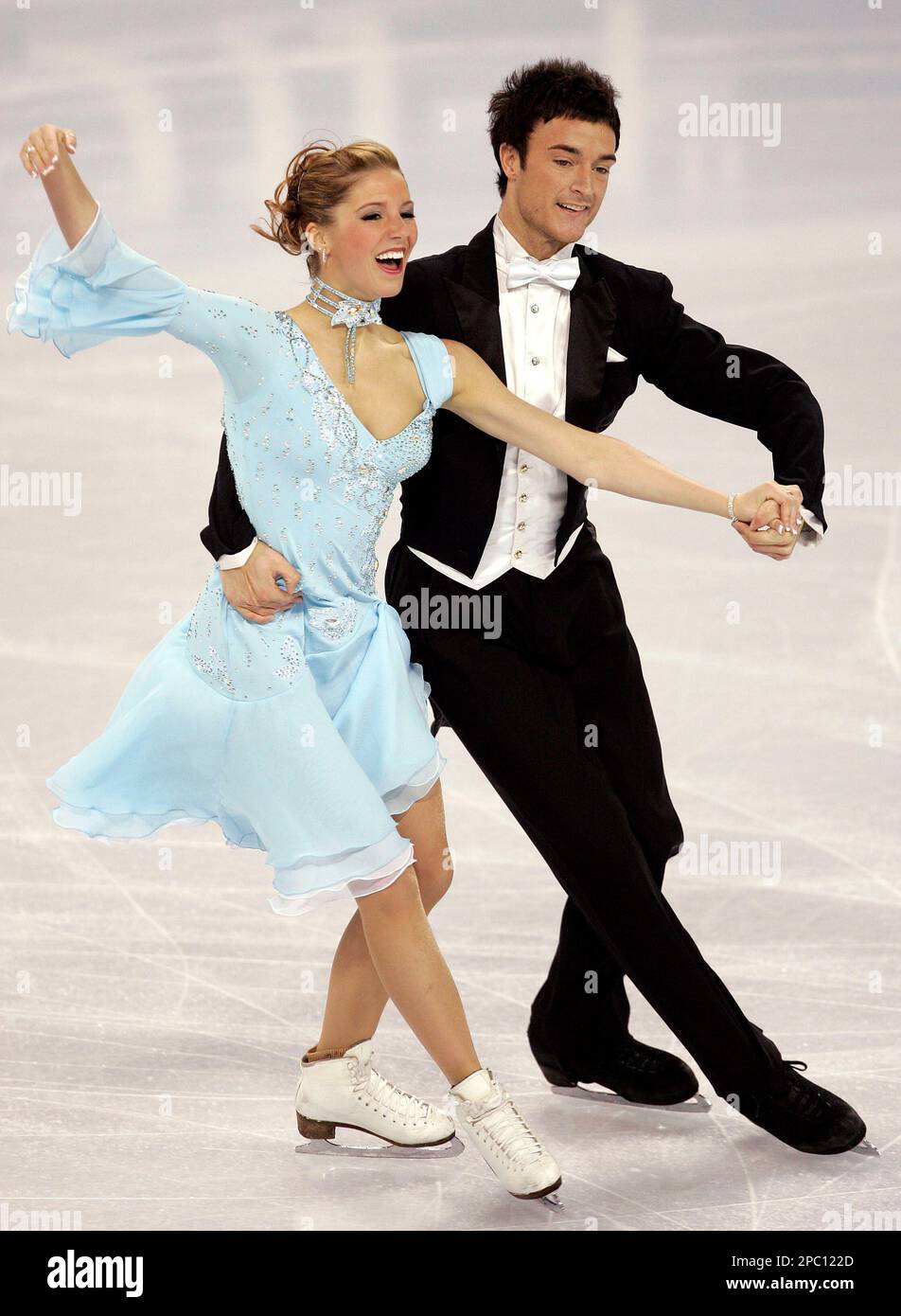 Lauren Senft, left, and Leif Gislason, of Canada, skate in the ice ...