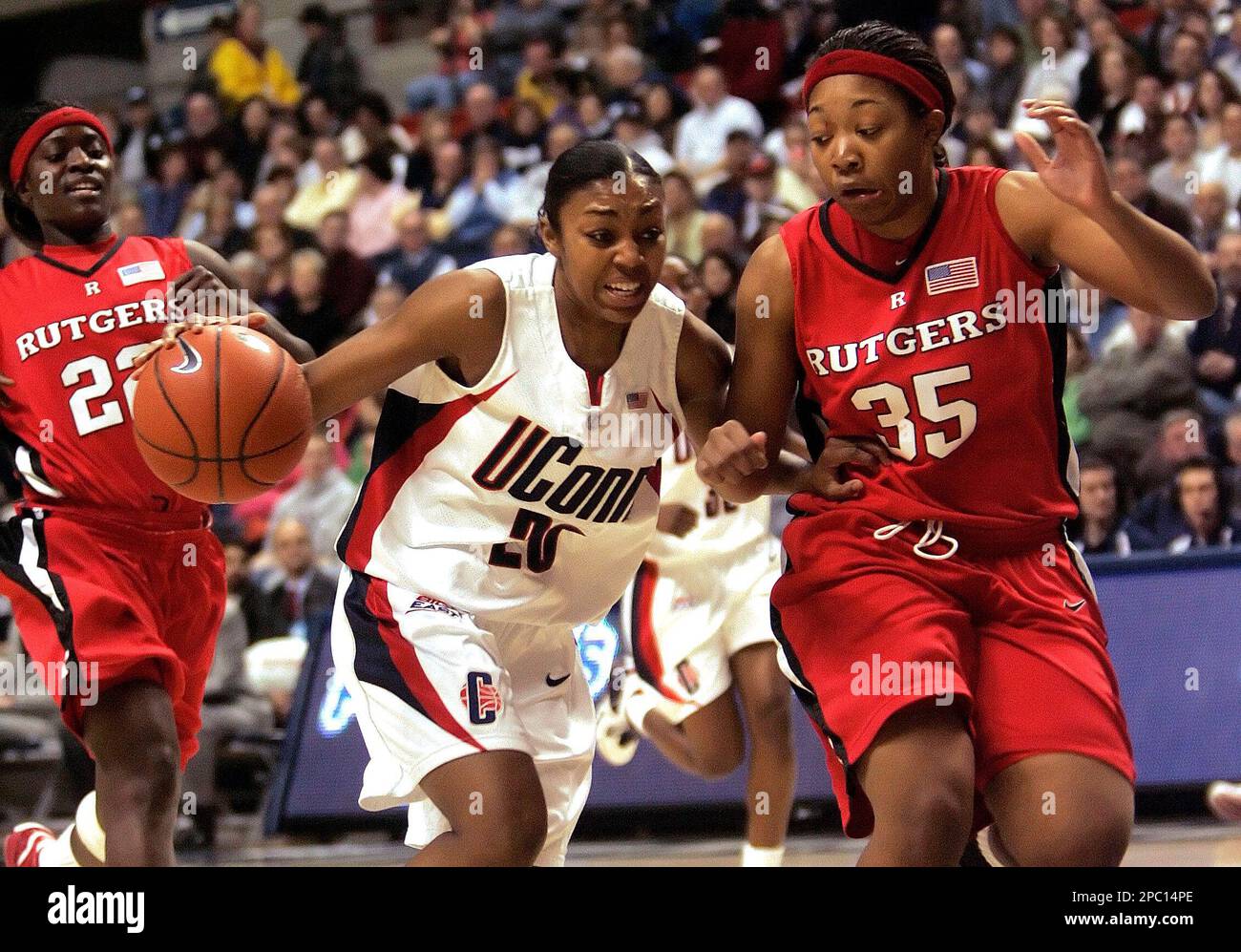 Connecticut's Renee Montgomery brings the ball up the court as Rutgers ...
