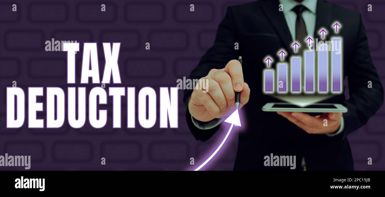 Sign displaying Tax Deduction. Business approach amount subtracted from ...