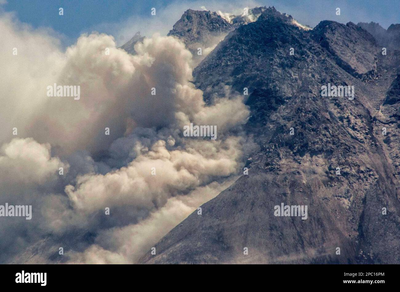 Yogyakarta, Indonesia. 13th Mar, 2023. Volcanic materials spew from ...