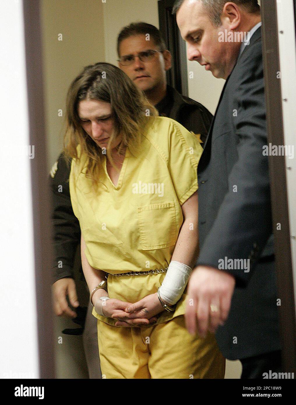 Jennifer Kukla is brought into her arraignment on two counts of first ...