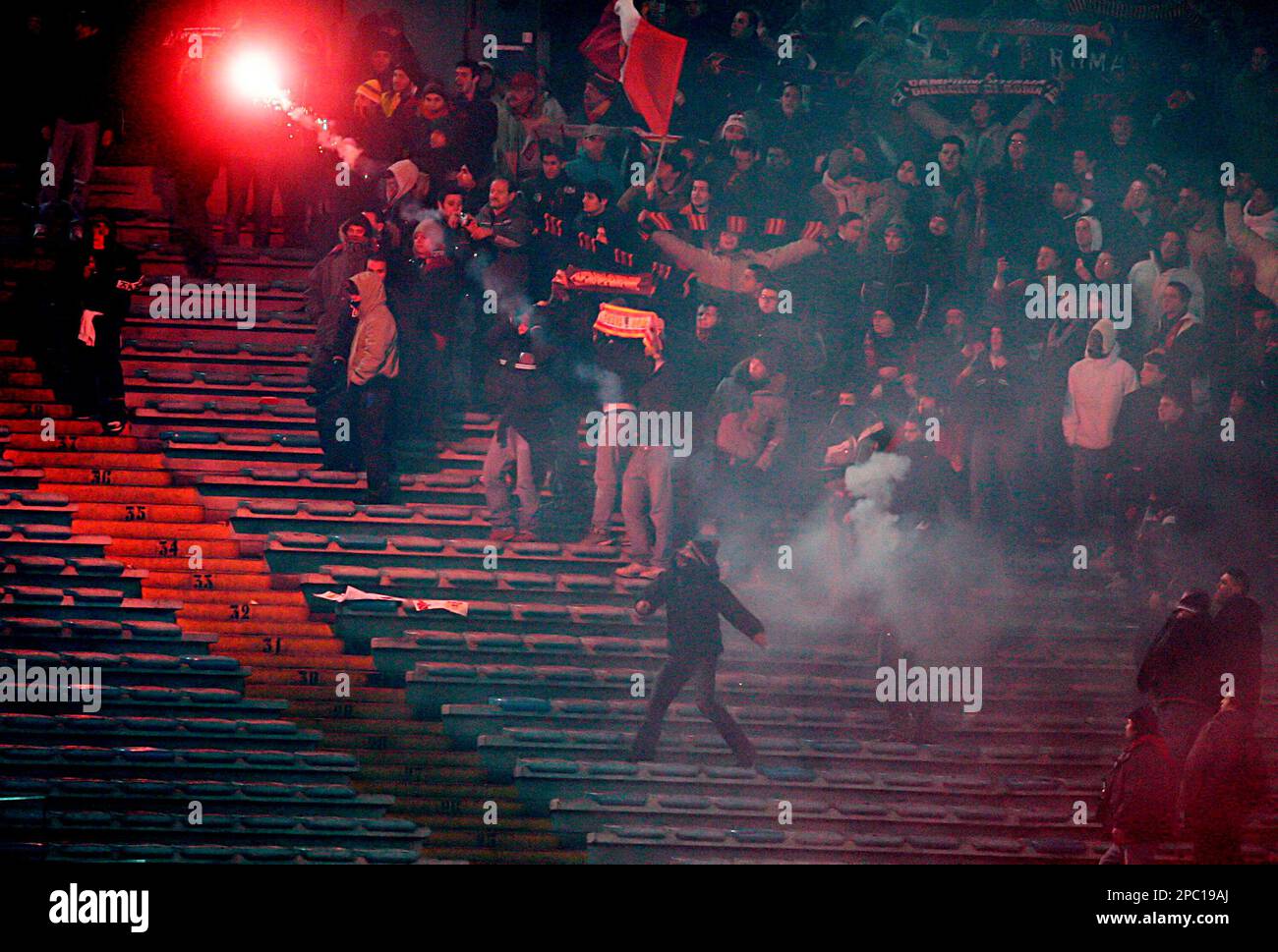 **FILE** A Roma's supporter throws a flare during the Italian Serie A ...