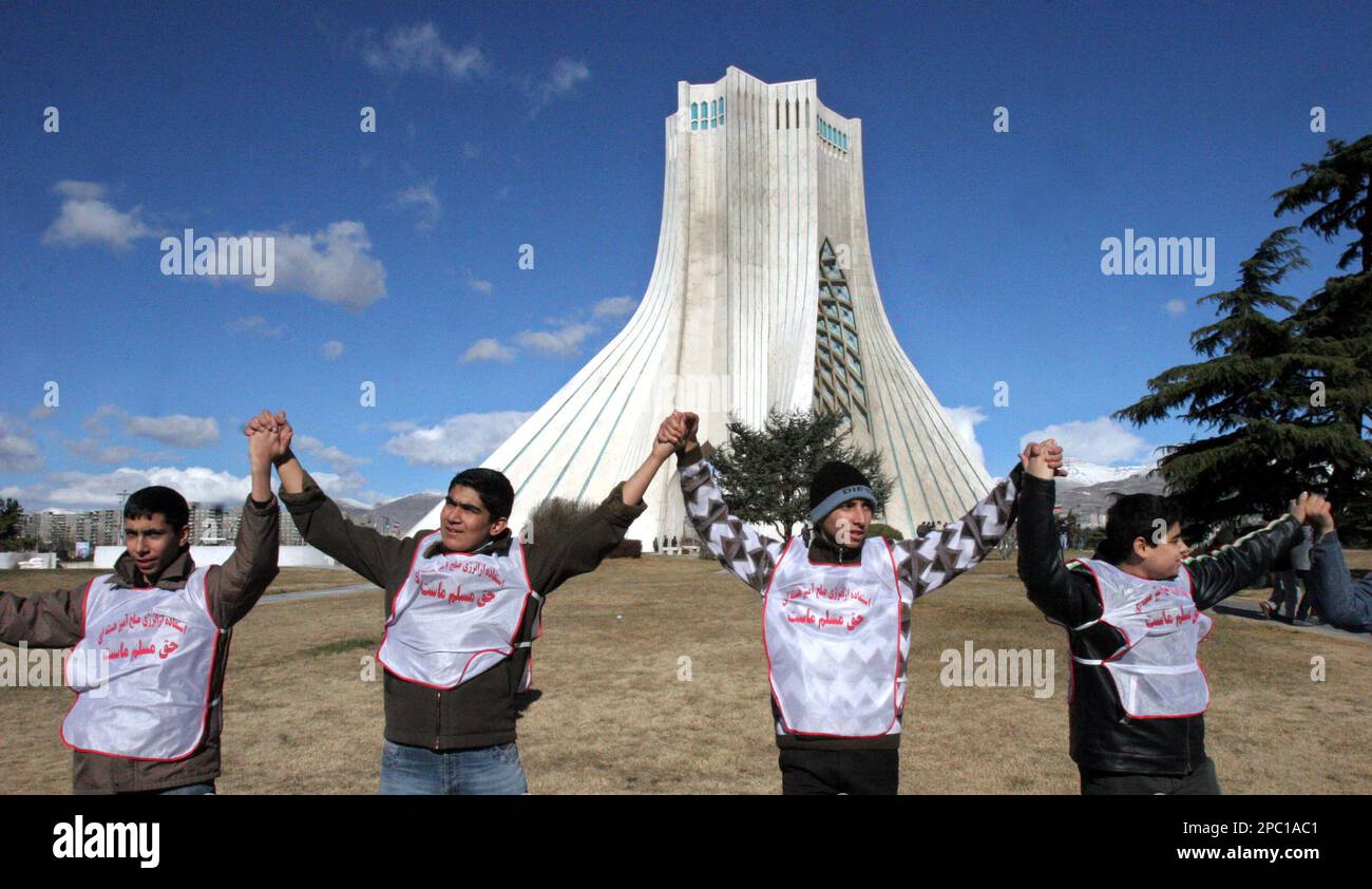 Iranian students form a human chain showing their support of Iran's ...