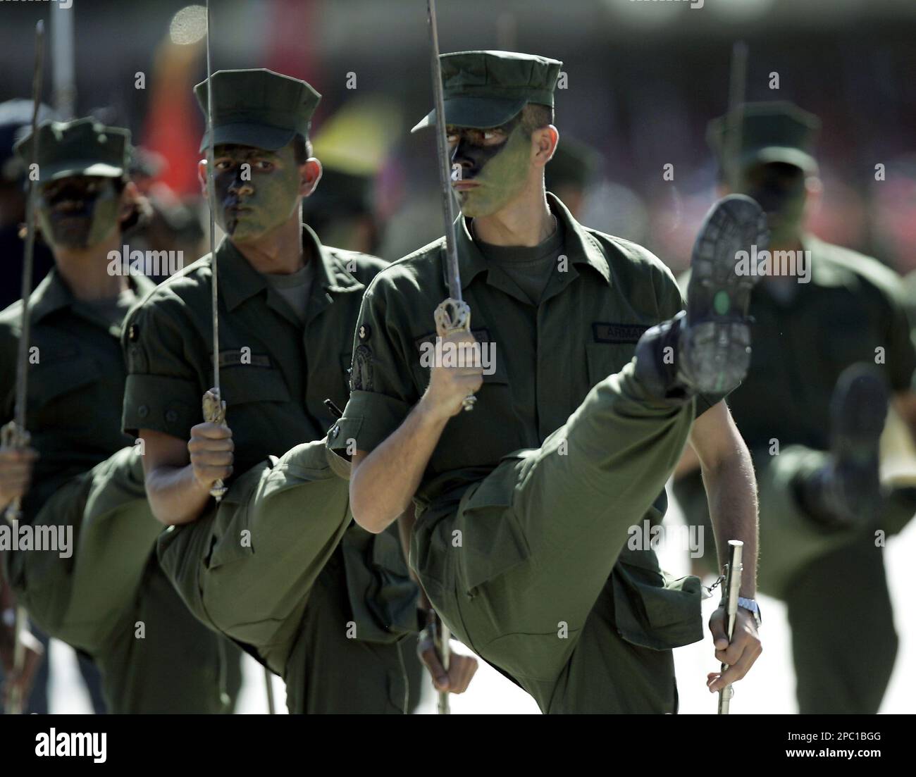 Venezuelan soldiers march during a military parade in Caracas, Sunday ...
