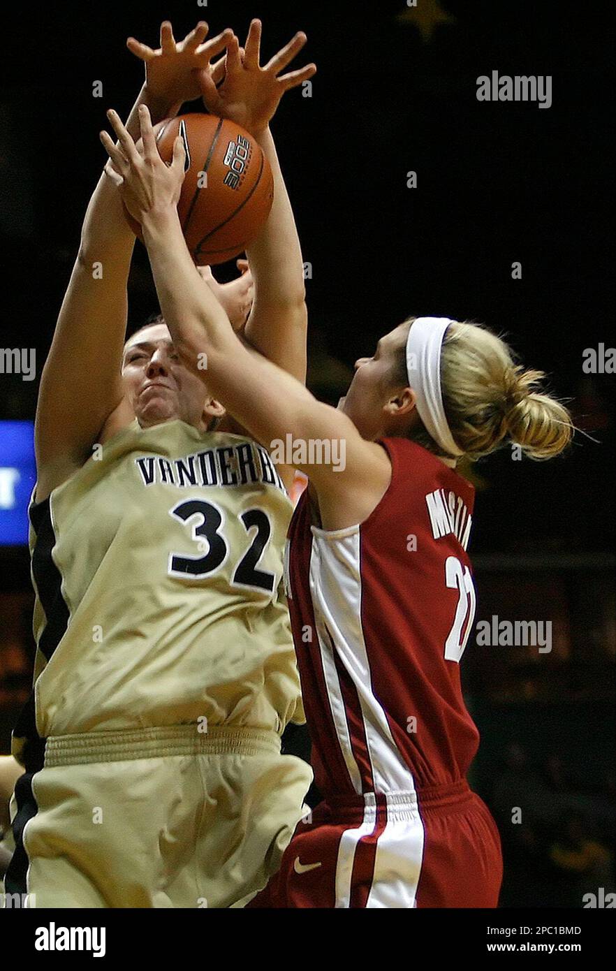 Alabama's Kate Mastin, right, has her shot blocked by Vanderbilt's Liz ...