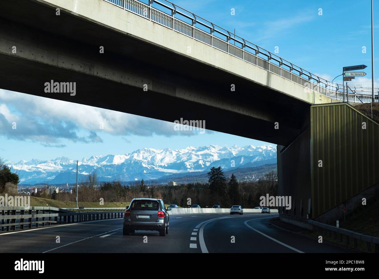 Sursee, Switzerland, 13.03.23. : Car traffic on swiss highway with Alps ...