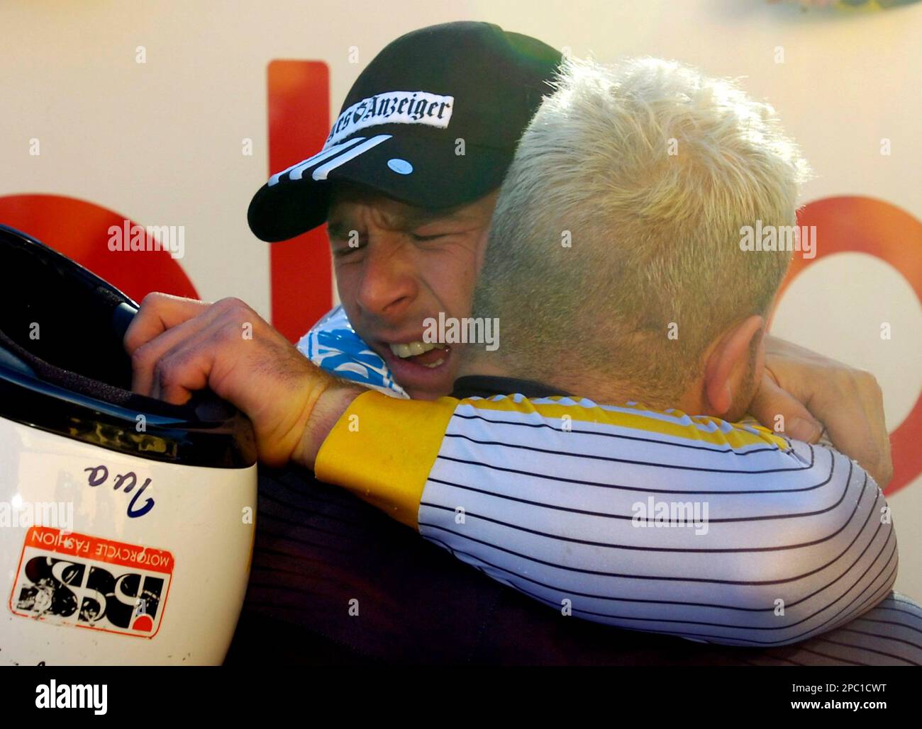 New world champion Swiss Ivo Ruegg, left, hugs outgoing world champion ...