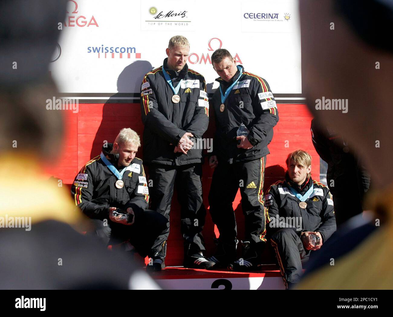 Bronze medal winners Andre Lange, Rene Hoppe, Martin Putze and Kevin ...