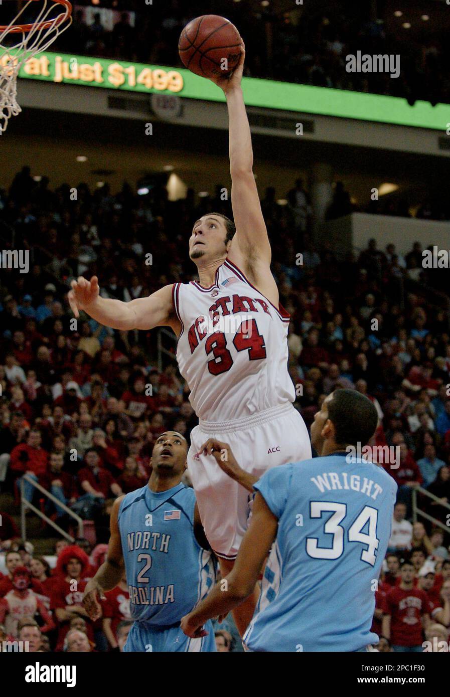 North Carolina State's Ben McCauley (34) splits North Carolina ...