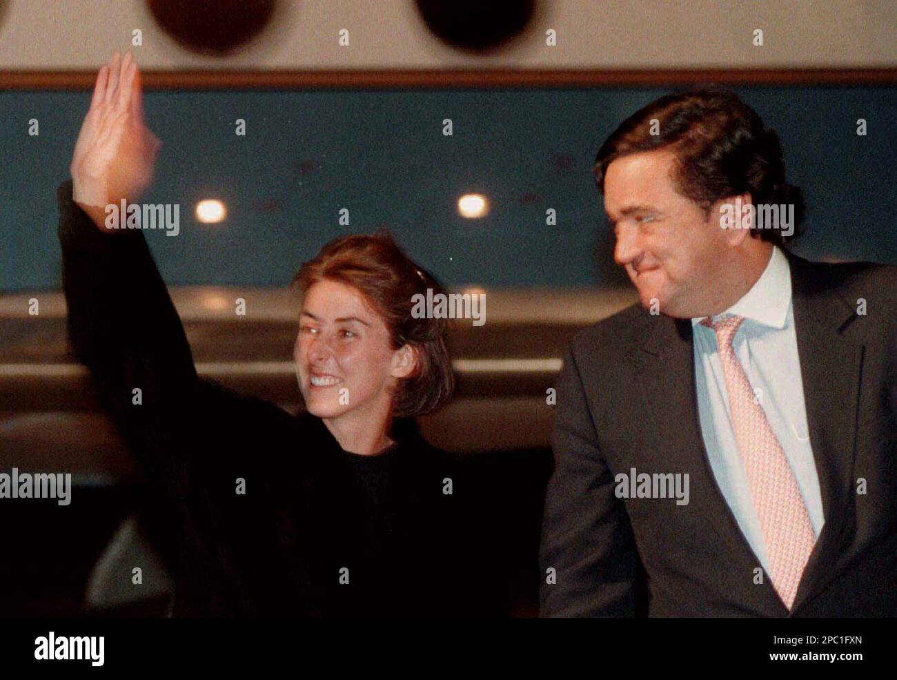 ** FILE ** Australian nurse Maree Worthington, left, waves as she arrives at the Geneva airport ...