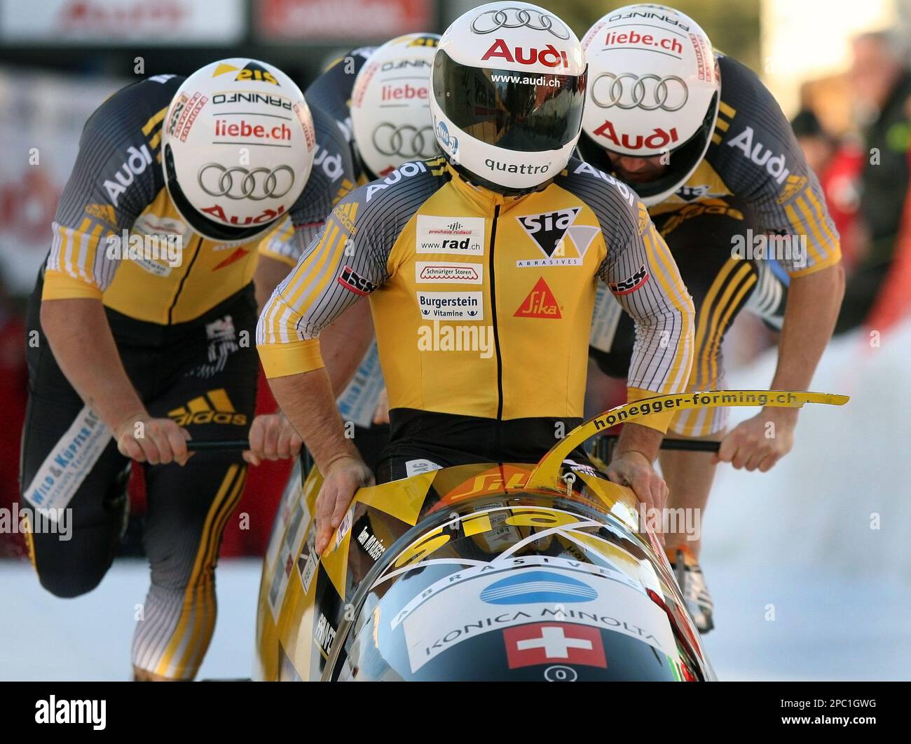 Bob Switzerland 1 starts with pilot Ivo Rueegg, in front, Beat Hefti ...