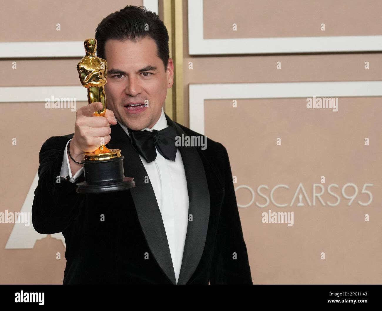 Los Angeles, USA. 12th Mar, 2023. Jonathan Wang poses with the Oscar ...