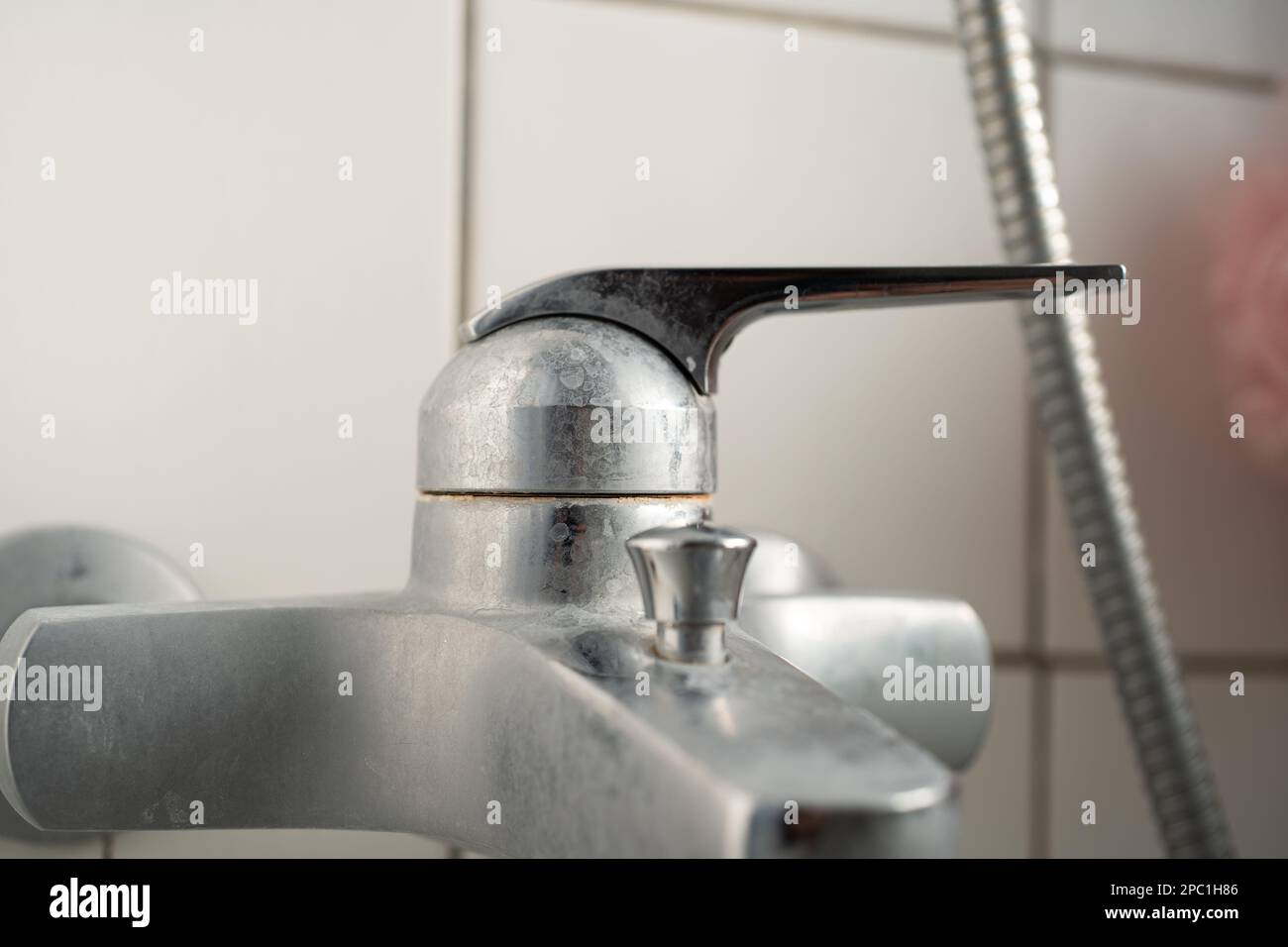 Water deposit shower tap hi-res stock photography and images - Alamy