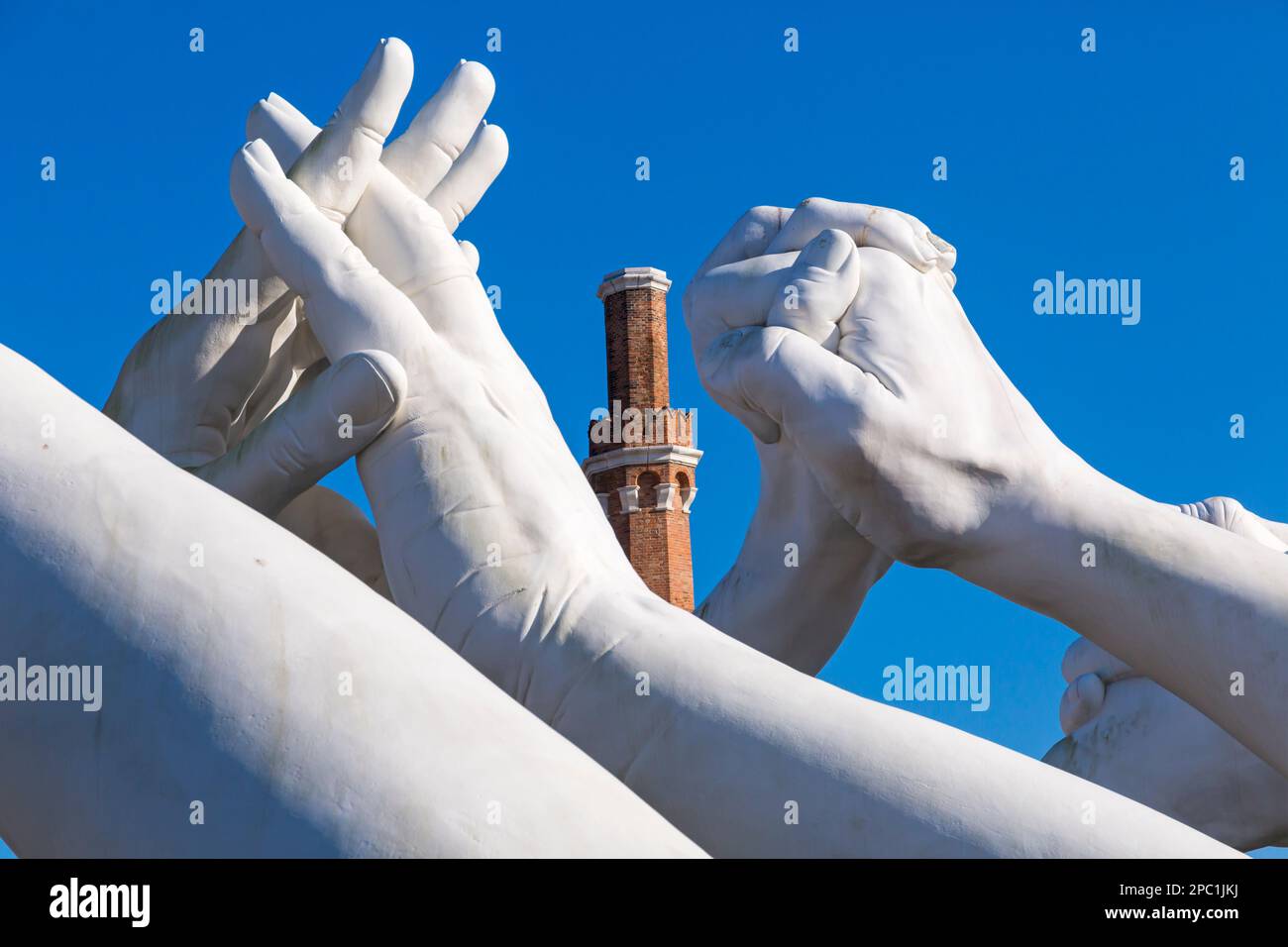 Building Bridges sculpture by artist Lorenzo Quinn depicting 6 pairs of ...