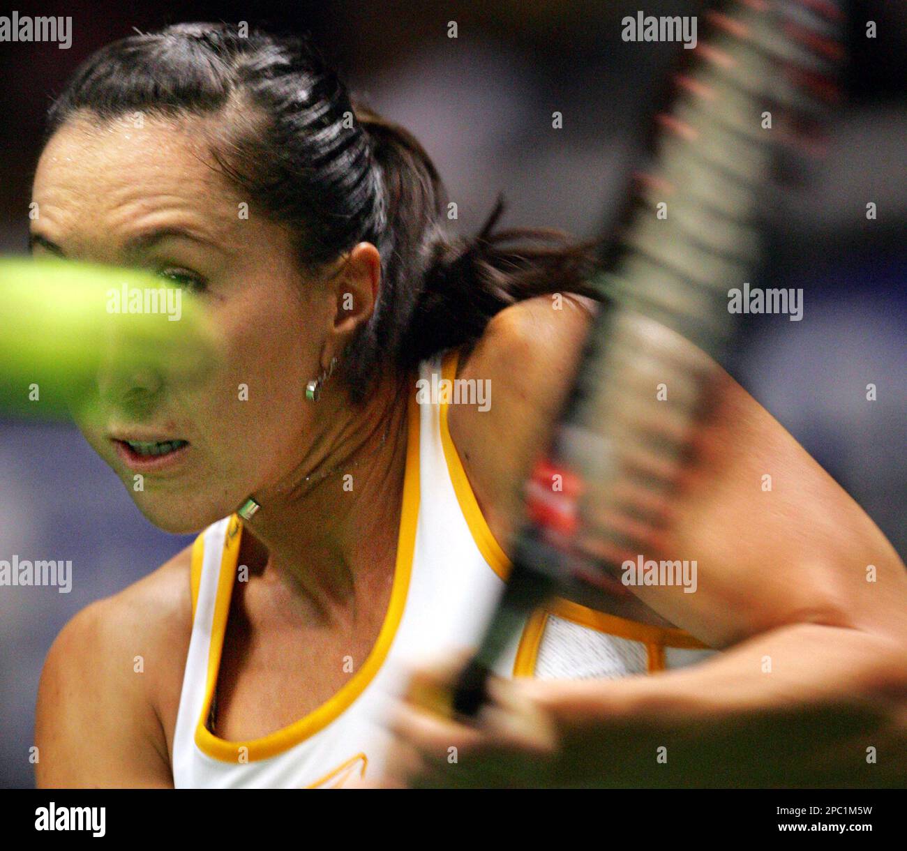 Serbia's Jelena Jankovic returns the ball against her compatriot Ana ...