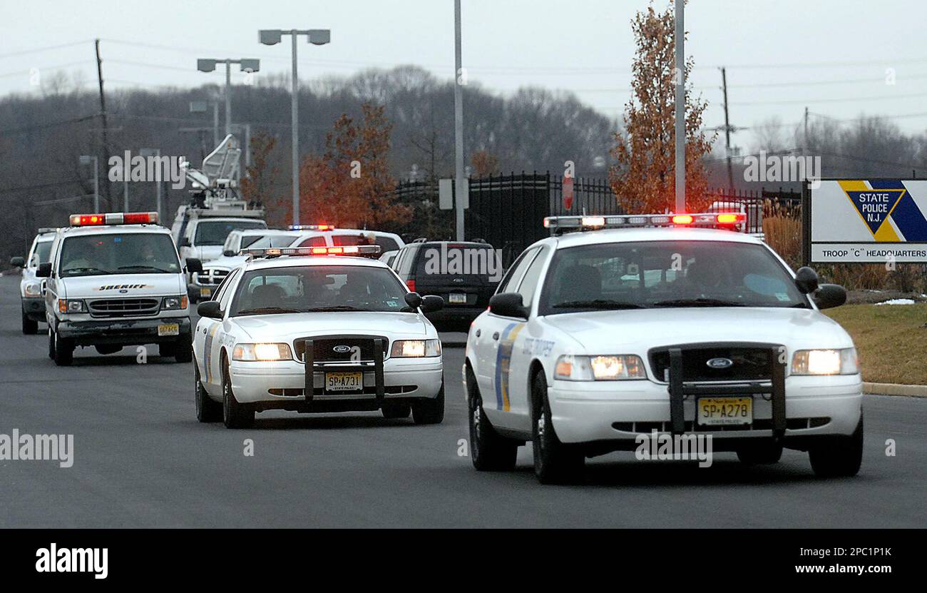 A group of New Jersey State Police and Mercer County Sheriff's vehicles ...
