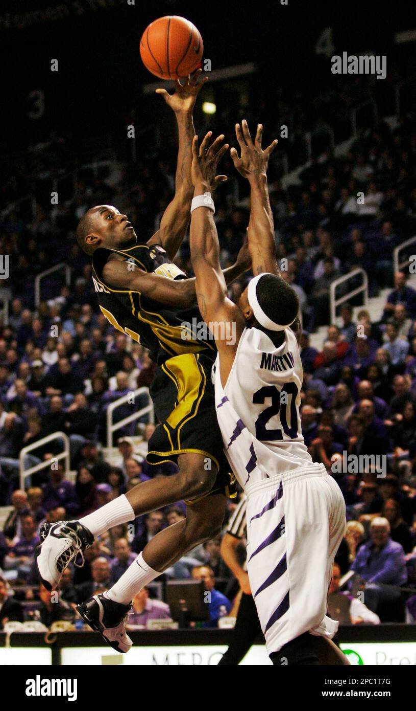 Missouri guard Keon Lawrence (2) shoots over Kansas State forward ...