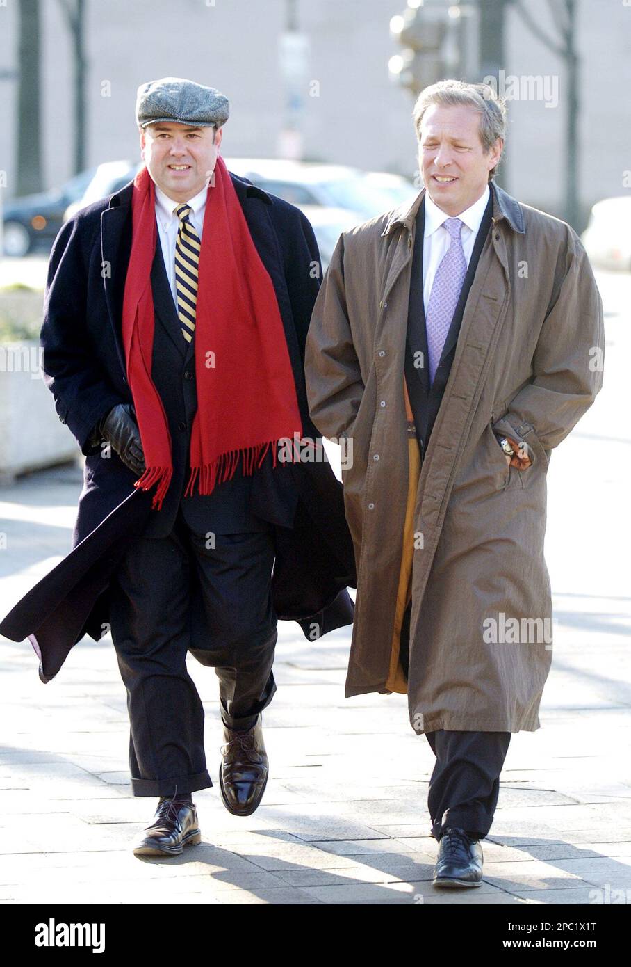 Journalist Matthew Cooper, left, and his attorney Richard Sauber arrive ...