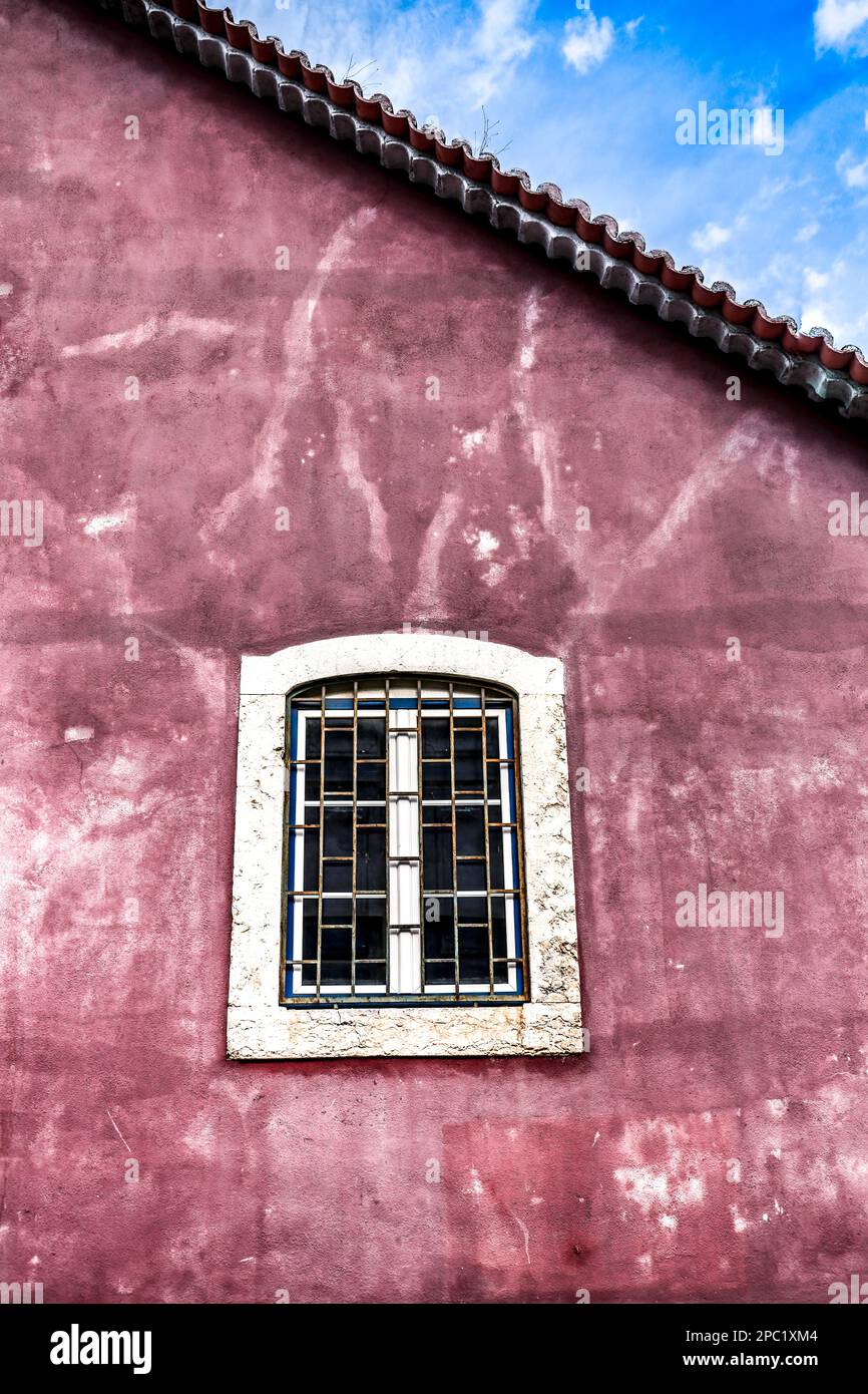 Old colorful and bright typical facade in Lisbon with beautiful white ...