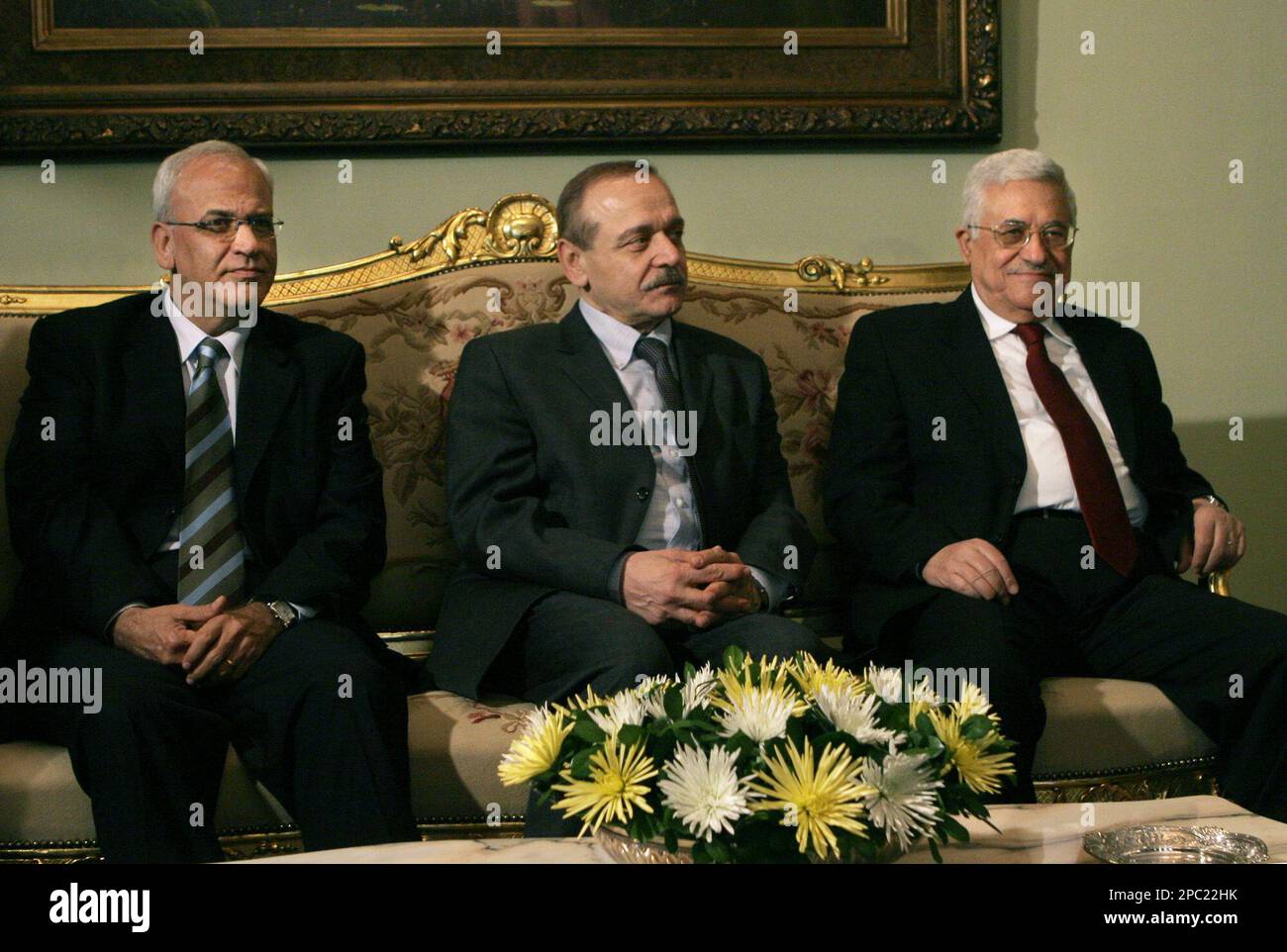 Palestinian leader Mahmud Abbas, right, his senior aide Yasser Abed ...